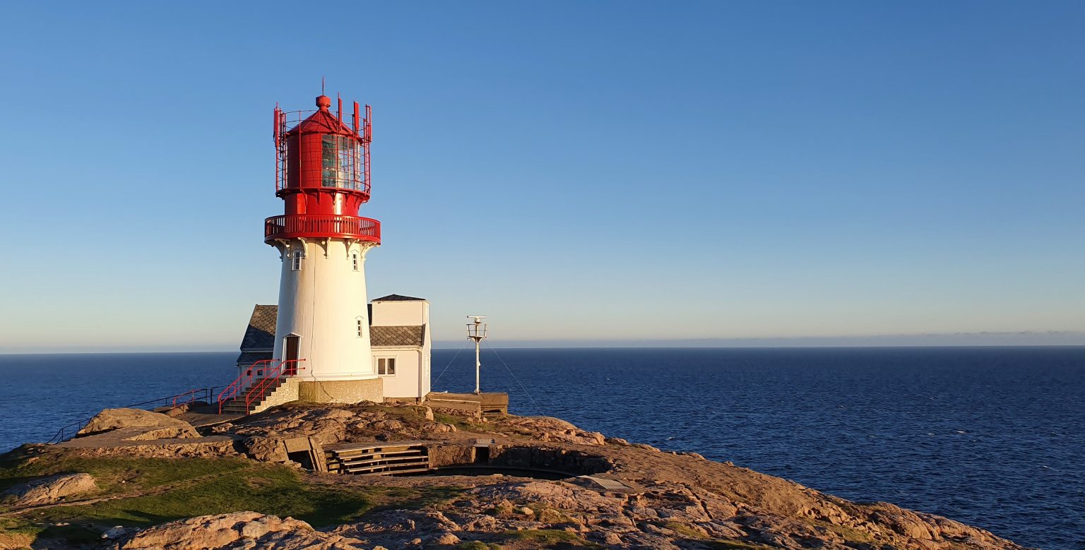 Lindesnes fyr - bobilparkering i solnedgang | Bobilreiser